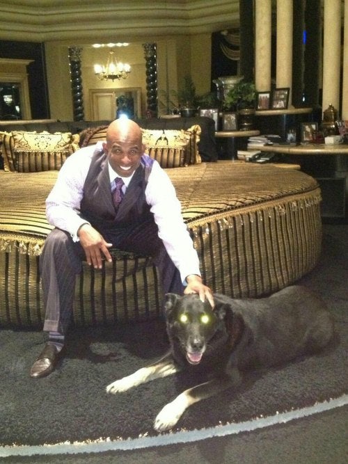 PHOTO: Deion Sanders and his scary-eyed dog - CBSSports.com