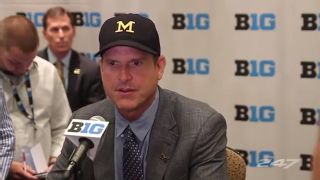 Jim Harbaugh gives Michigan TE Jake Butt his