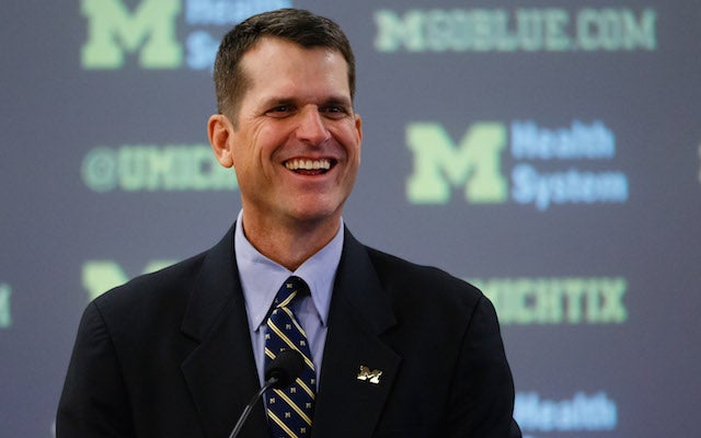 Michigan expanding recruiting presence through football camps ...