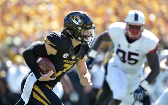 Golden's seat hotter: Canes squander big lead, squeak by Huskers in OT ...