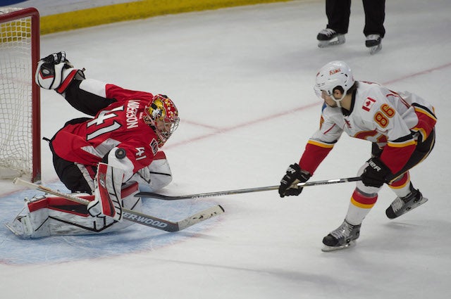 Flames erase four-goal third period deficit, steal point - CBSSports.com