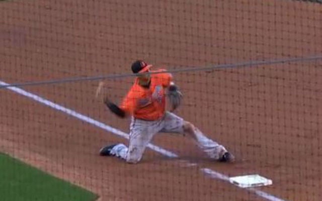 WATCH: Manny Machado makes a crazy throw from his knee - CBSSports.com