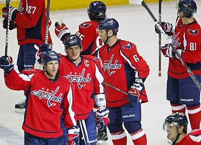 Australian here wanting to get into watching hockey. Which team should ...